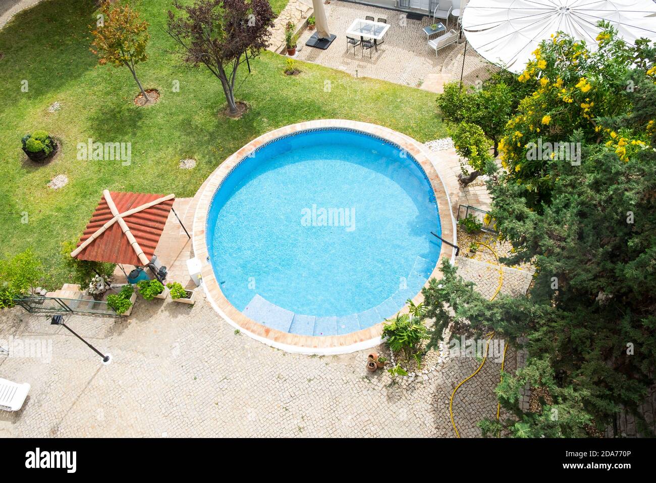 top view beautiful circular pool on a garden Stock Photo - Alamy