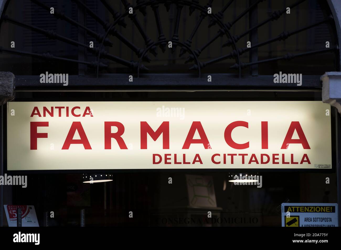 4 JUNE 2018, MILAN, ITALY: Signs of pharmacies on the streets of Milan ...