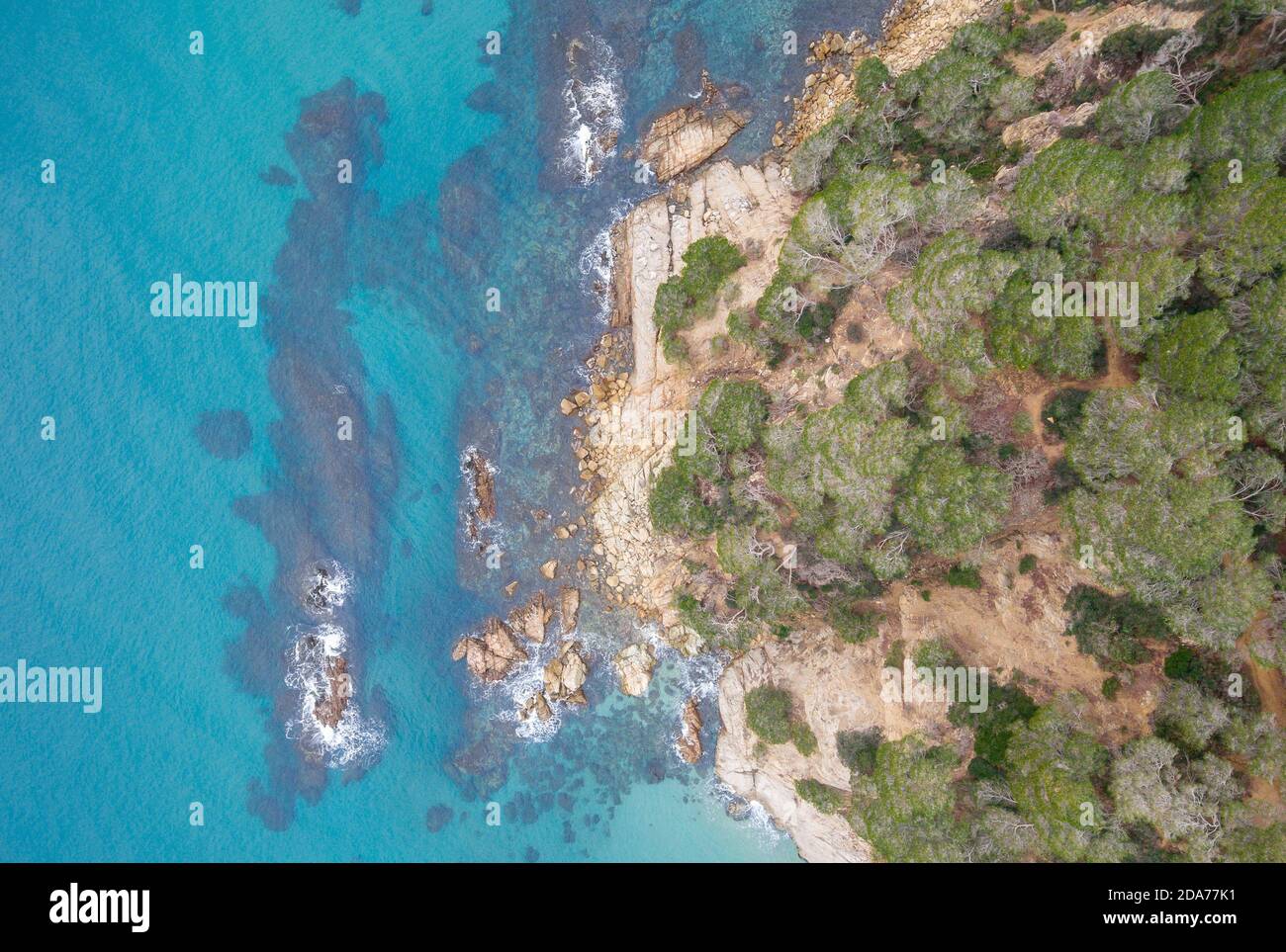 Aerial views of the rocks in the sea on a sunny day in the Costa Brava ...