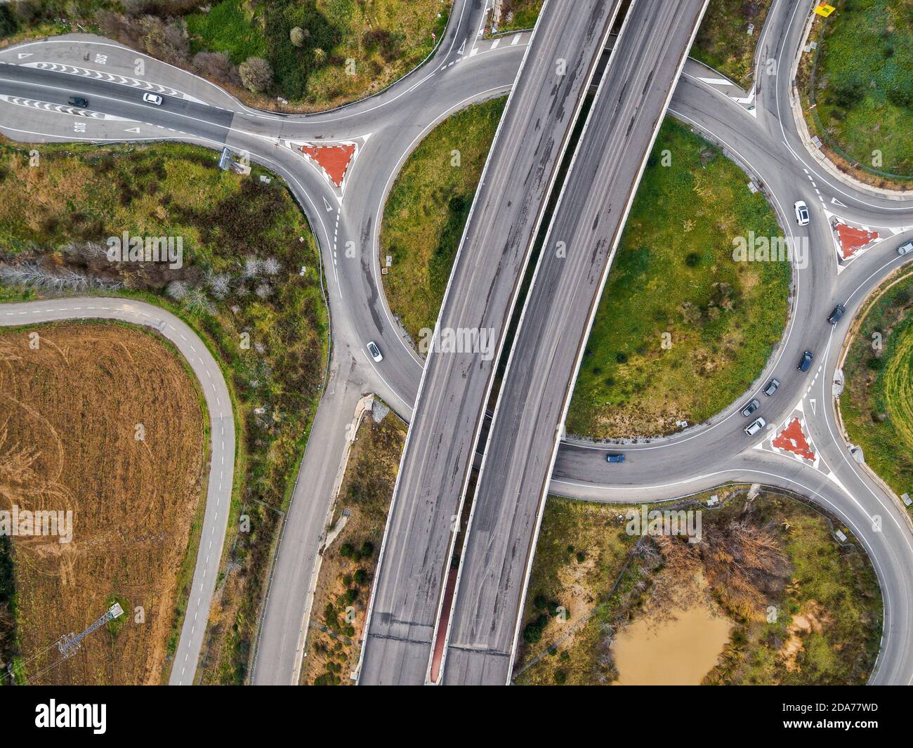 Photography aerial of a highways with little traffic on a cloudy day ...