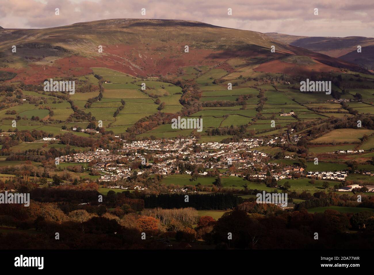 The Black Mountains tower over the Town of Crickhowell in Autumn ...