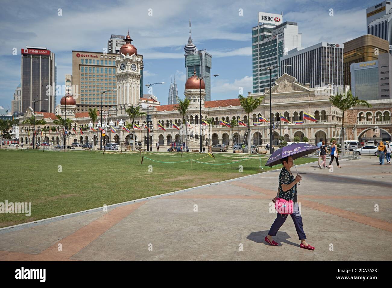 Kuala Lumpur, Malaysia, February 2016. People walking in Merdeka Square ...