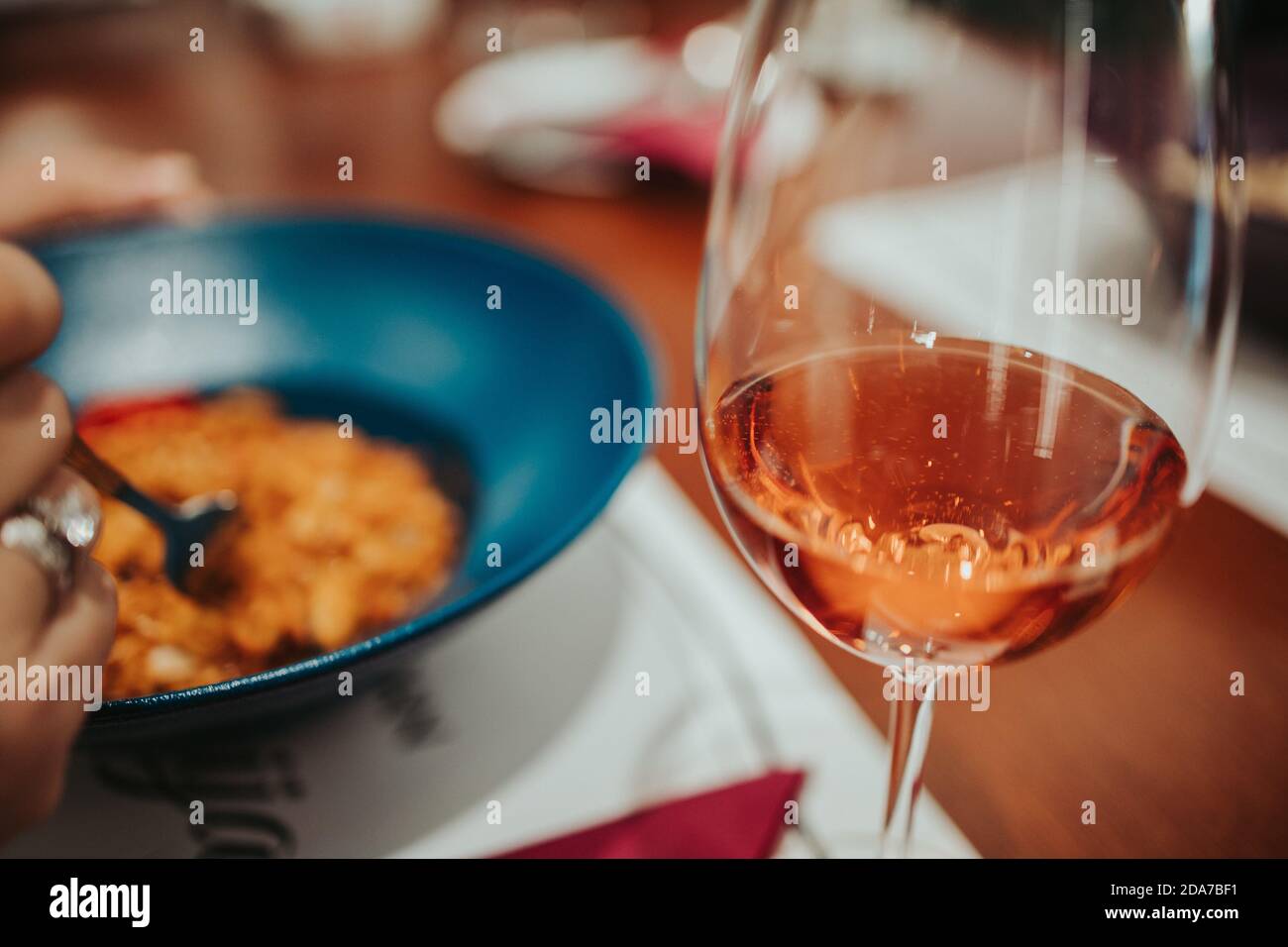 High angle shot of a person eating a tasty dish in the restaurant Stock ...