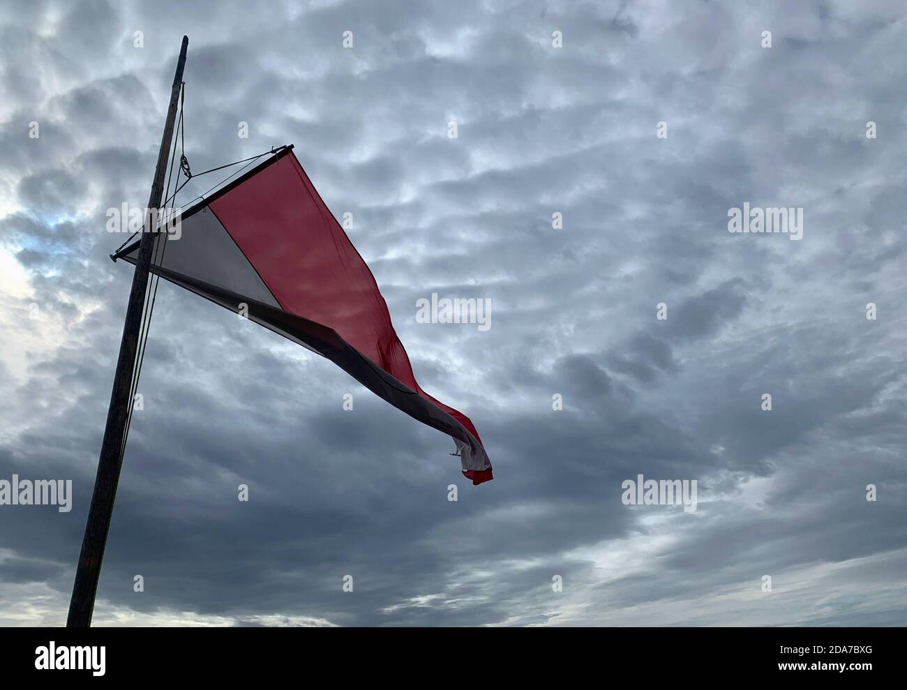 Flag waving in the wind Stock Photo - Alamy
