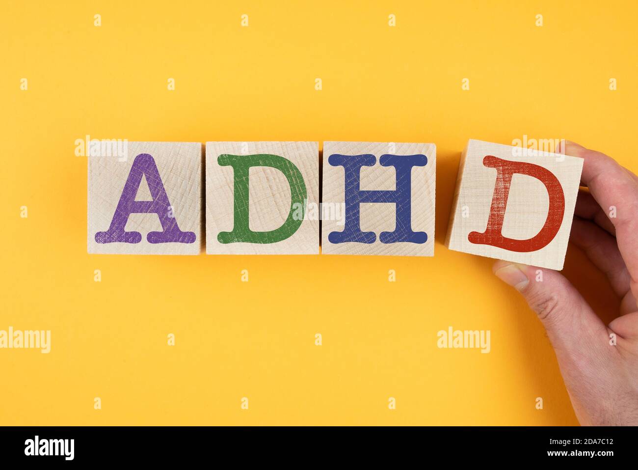 letters ADHD on wooden blocks, Attention Deficit Hyperactivity Disorder ...