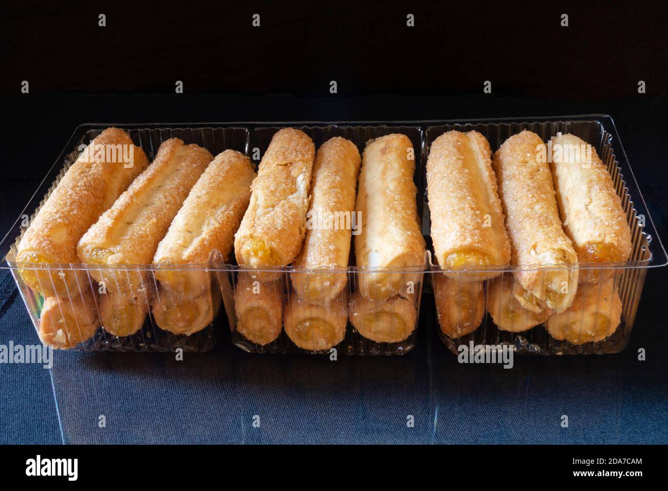 The Sweet sticks are with stuffing to rest upon glass table. The ...