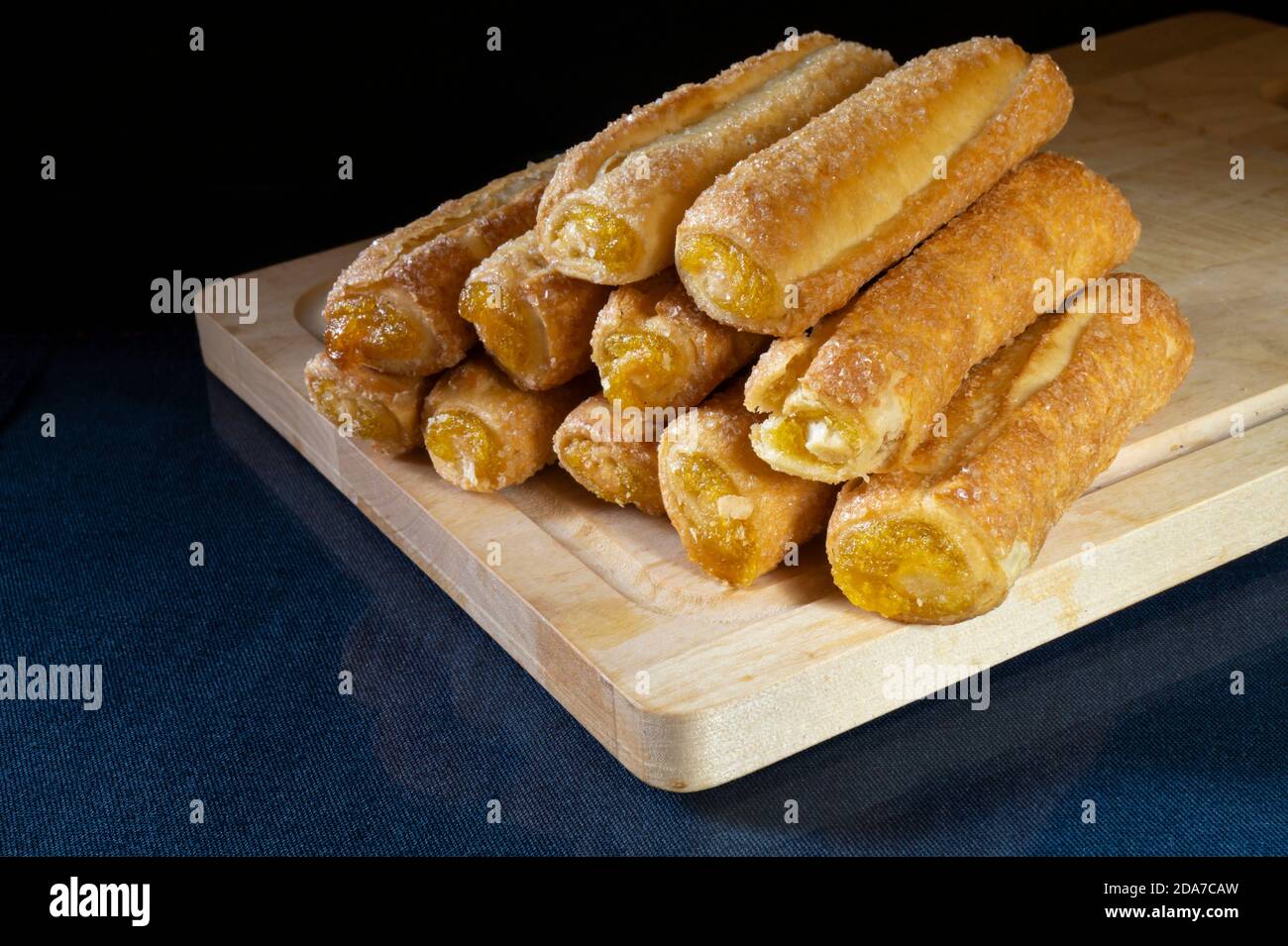The Sweet sticks are with stuffing to rest upon glass table. The ...