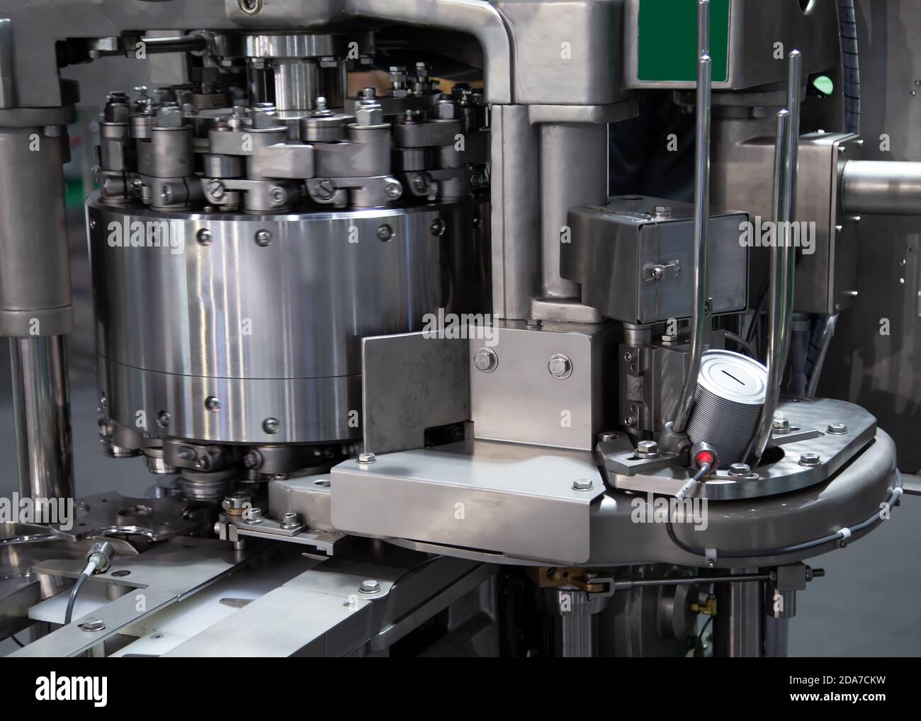 High speed can seamer machine. Aluminum can sealing machine Stock Photo ...