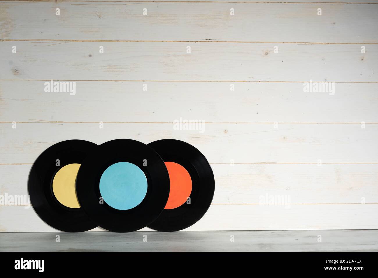 Three Vinyl records on wooden background,Old vintage vinyl records ...
