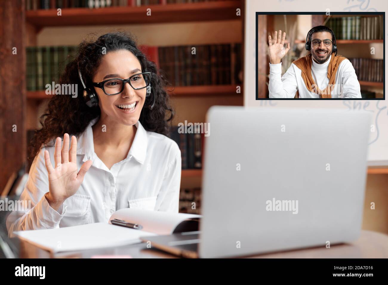 Woman In Glasses And Headset Having Video Conference Stock Photo - Alamy