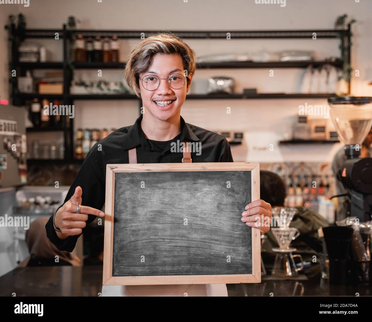 Handsome asian barista in coffee hi-res stock photography and images ...