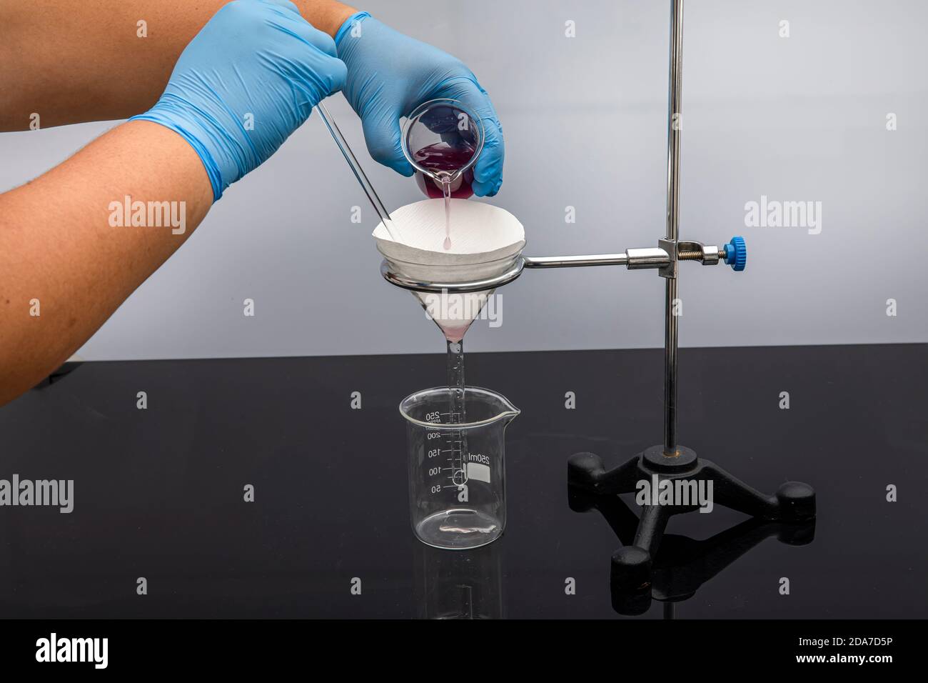 Filter paper in laboratory. Scientists are chemical filtration by ...