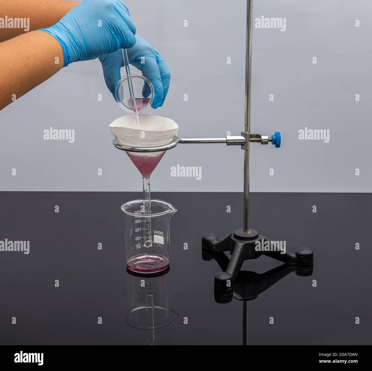 Filter paper in laboratory. Scientists are chemical filtration by ...