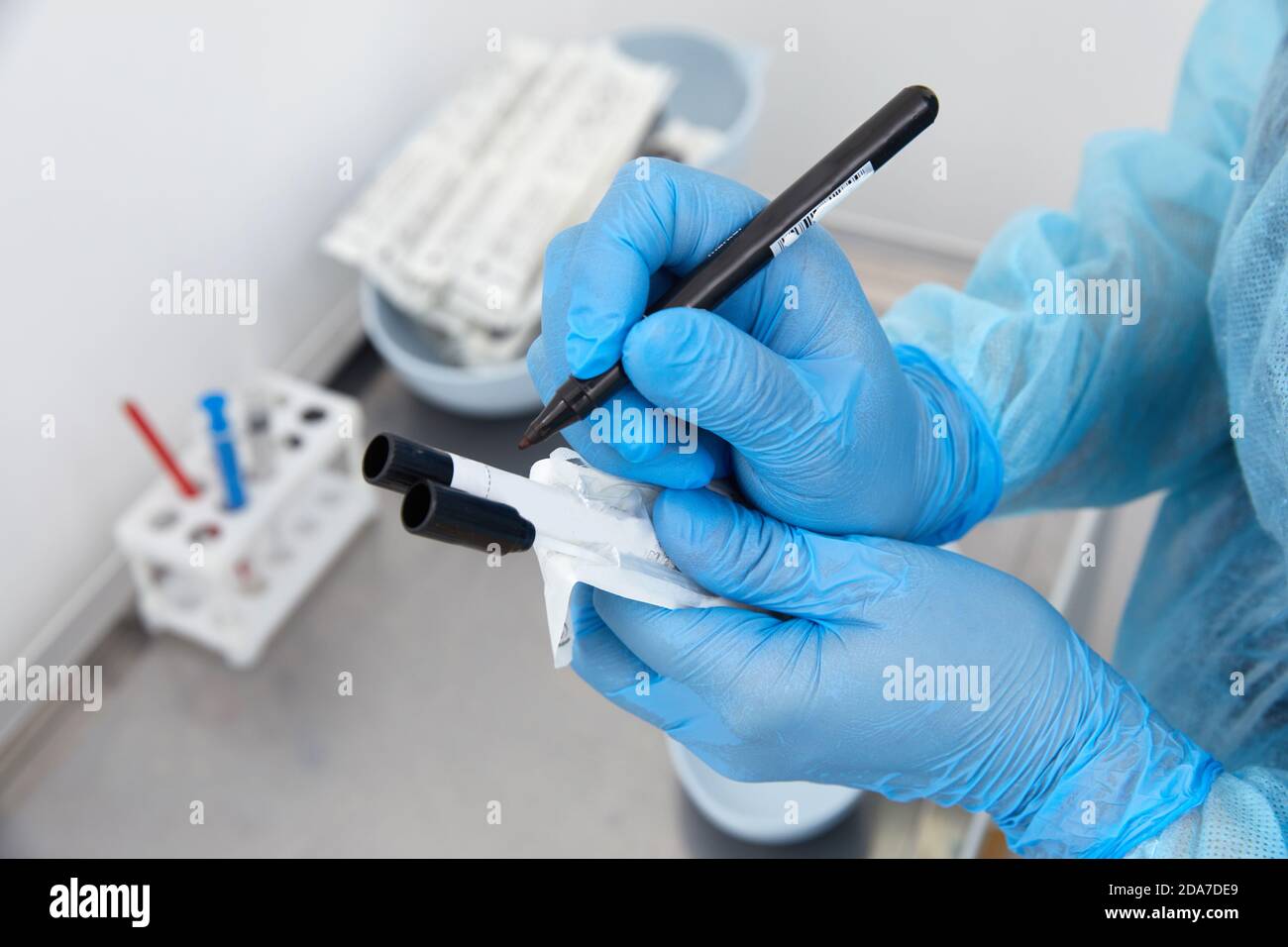 Scientist working with blood sample in laboratory Stock Photo - Alamy