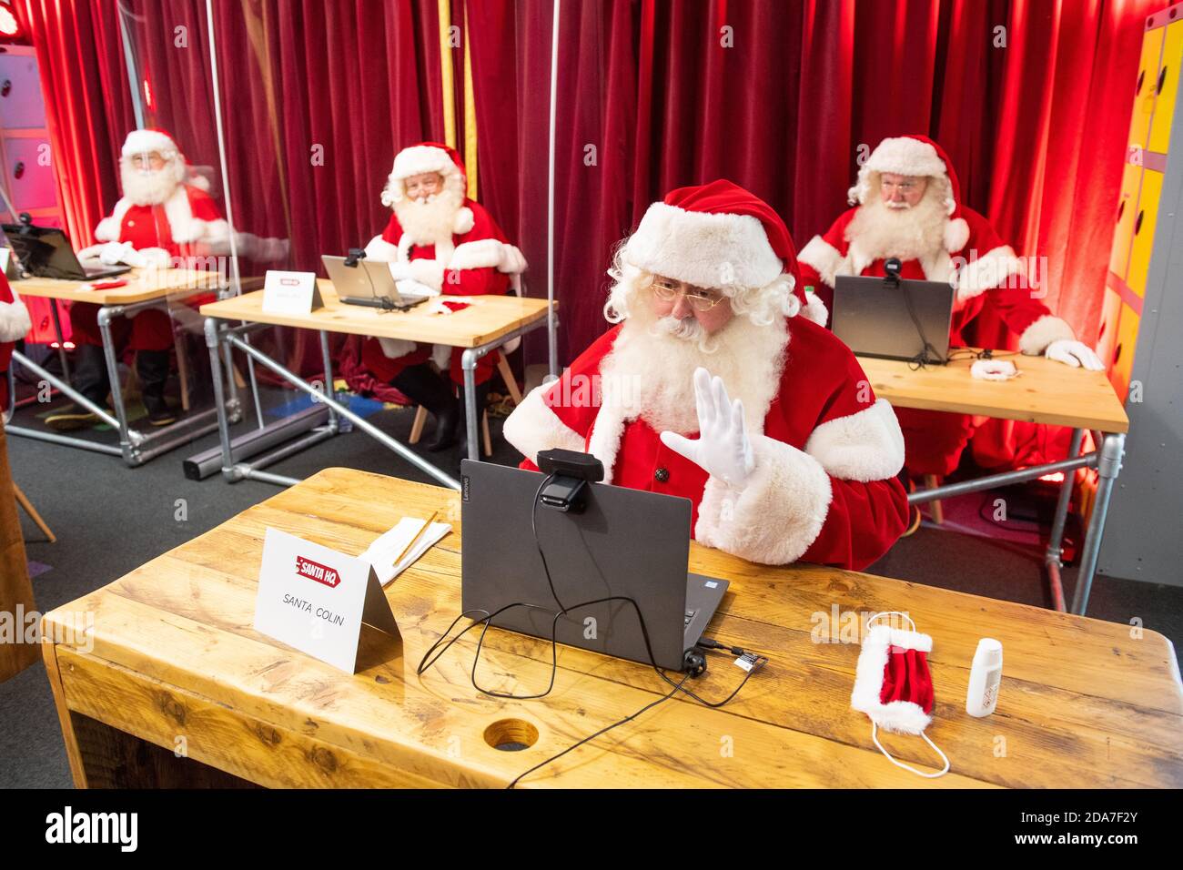 People dressed as Father Christmas at the launch of Santa HQ at the ...