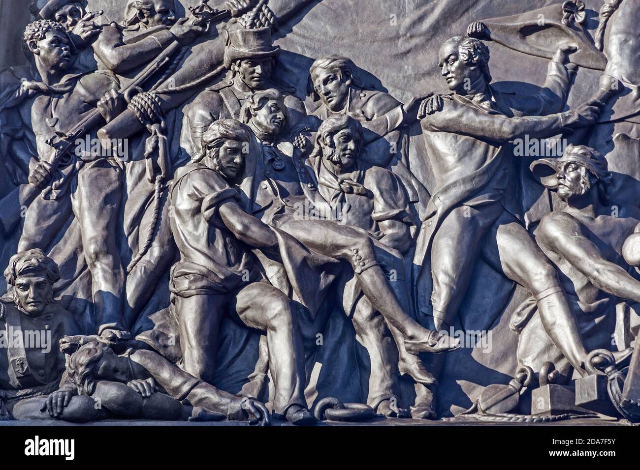 London, Trafalgar Square. One of four bronze reliefs at the base of ...