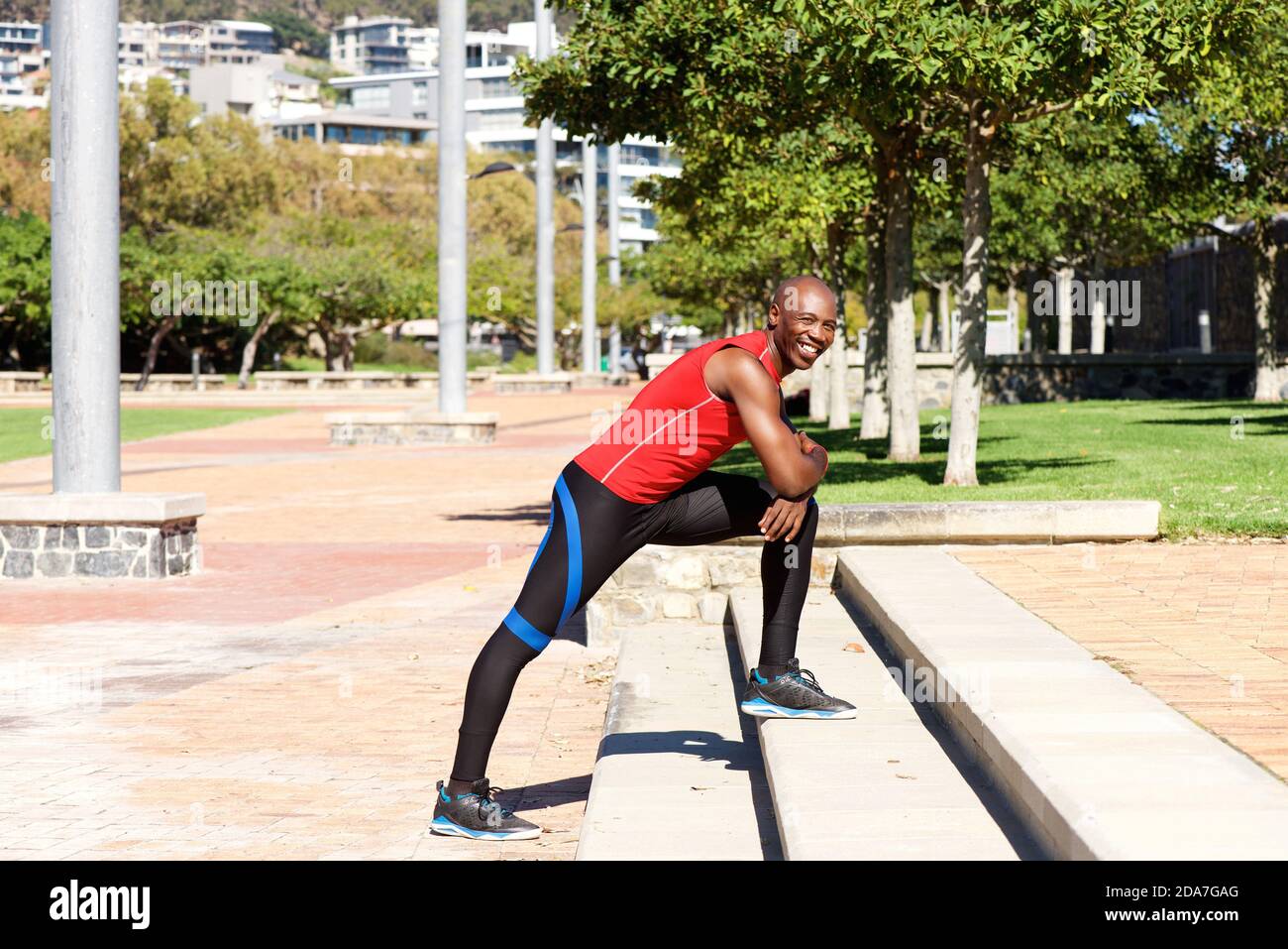 Portrait of fit young african man exercising on steps at the park Stock ...