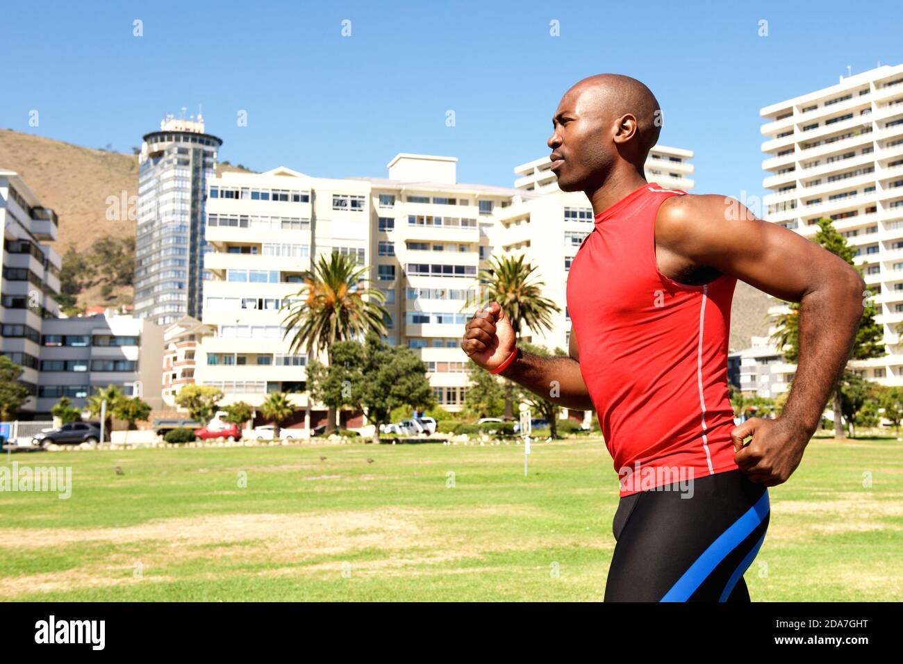 African man running city park hi-res stock photography and images - Alamy