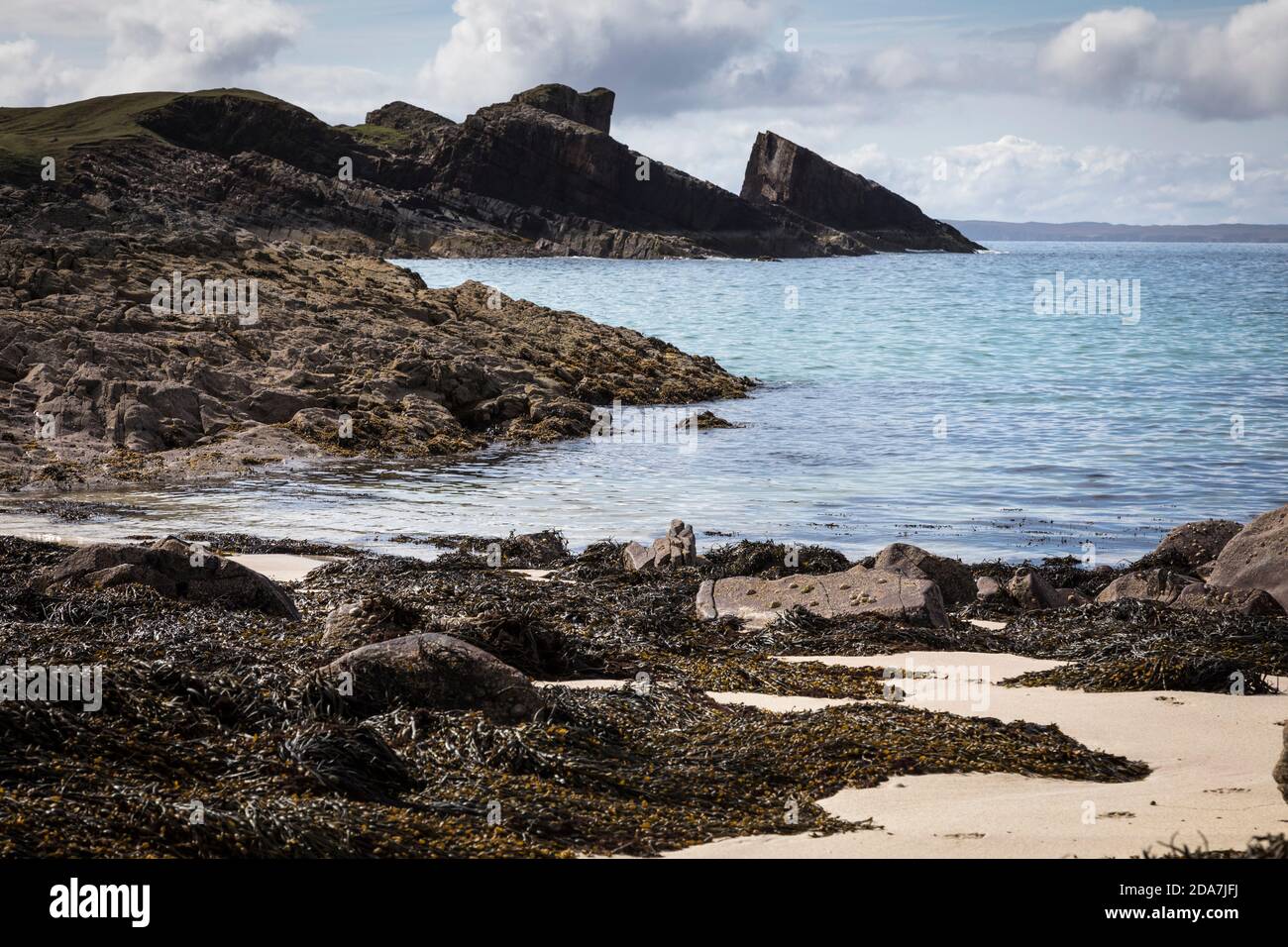 The famous 'Split Rock' at Clachtoll beach, Scotland Stock Photo - Alamy