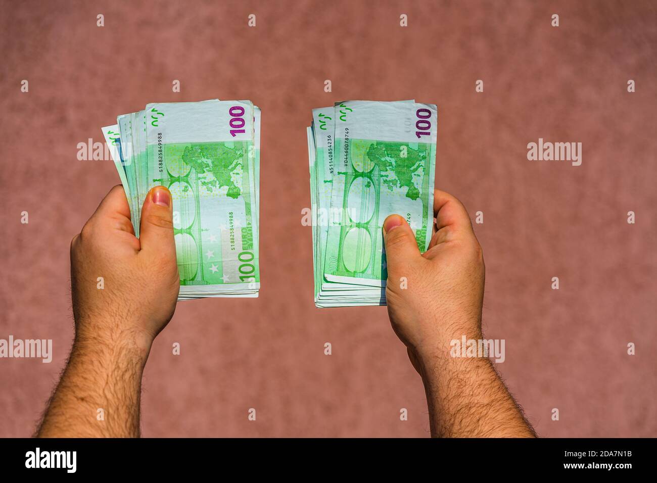 Hand holding and showing euro money or giving money. World money ...