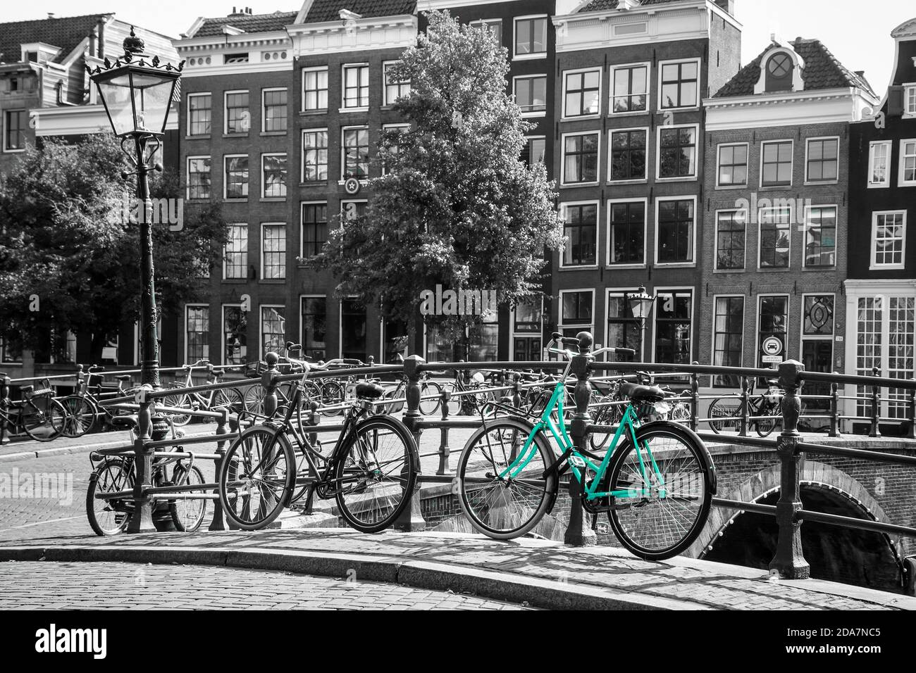 An azure bike on the streets of Amsterdam. Symbol for clean and ...
