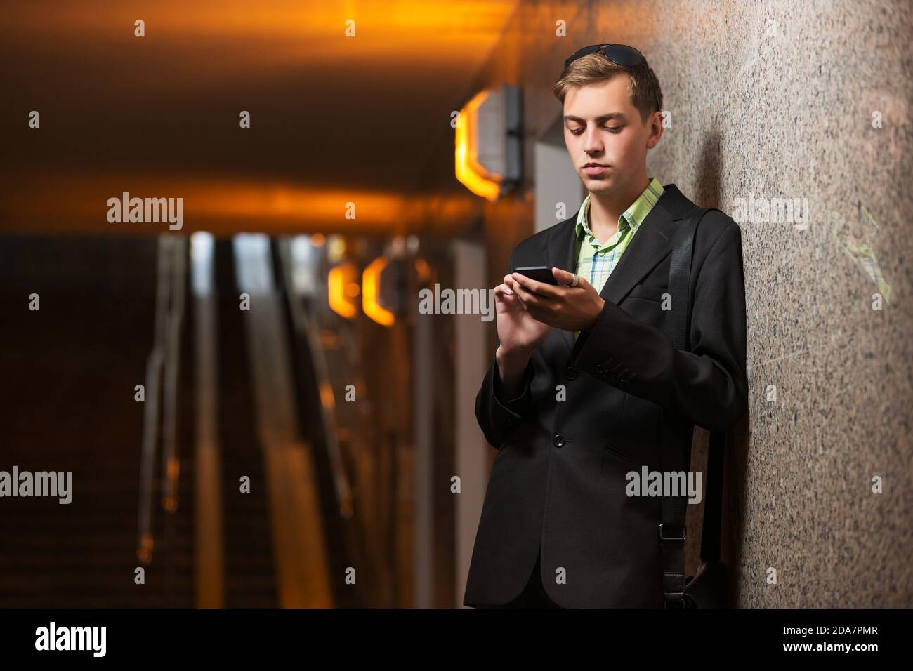 Young handsome business man using smart phone Stylish fashion male ...