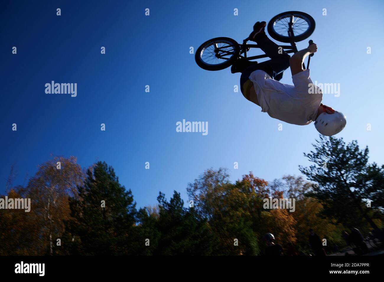 Berlin, Germany. 07th Nov, 2020. A young man rolls over with his bike ...