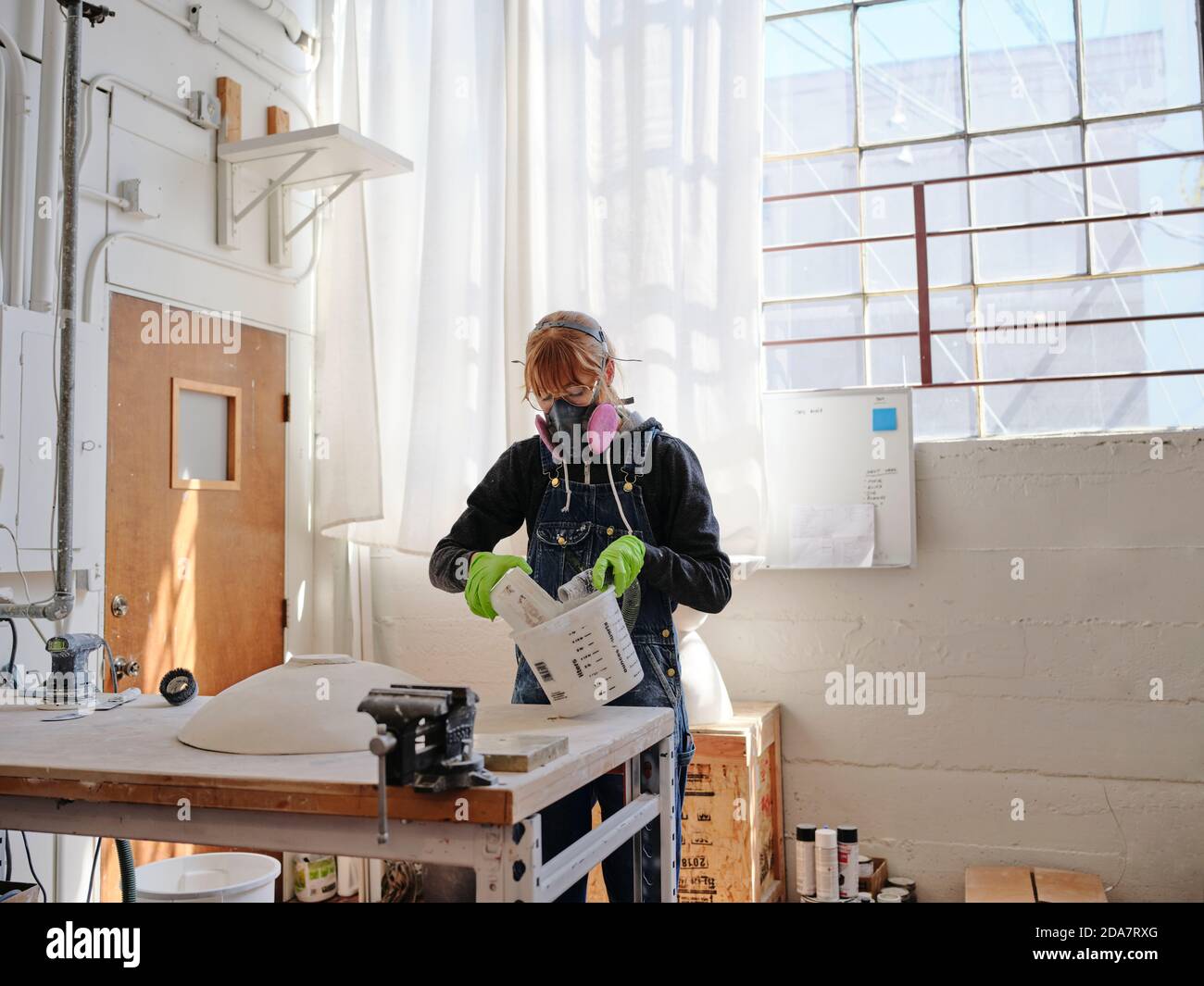 Professional female sculptor working with plaster in her studio Stock ...