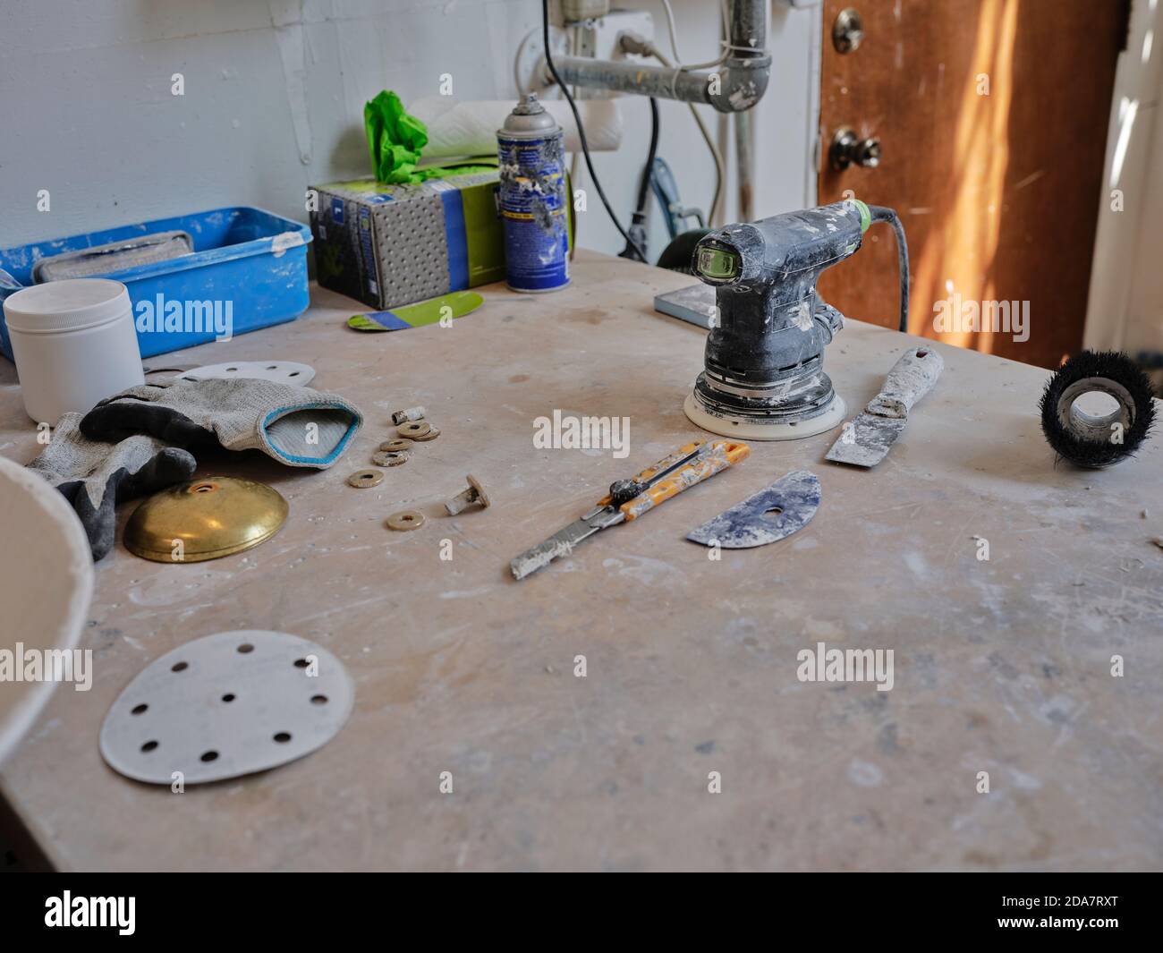 Close-up of tools in plaster studio Stock Photo - Alamy