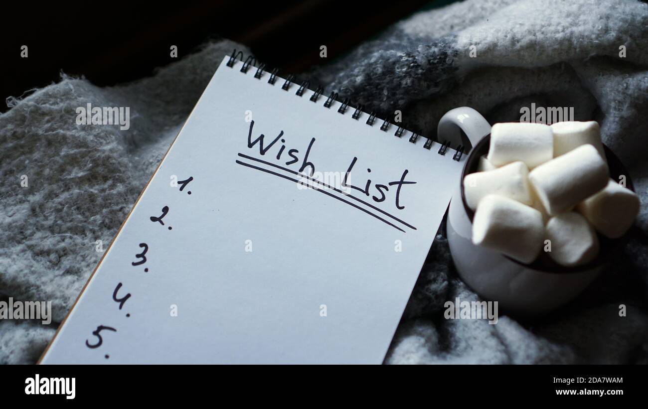 Christmas background with empty wish list, coffee mug with marshmallow ...