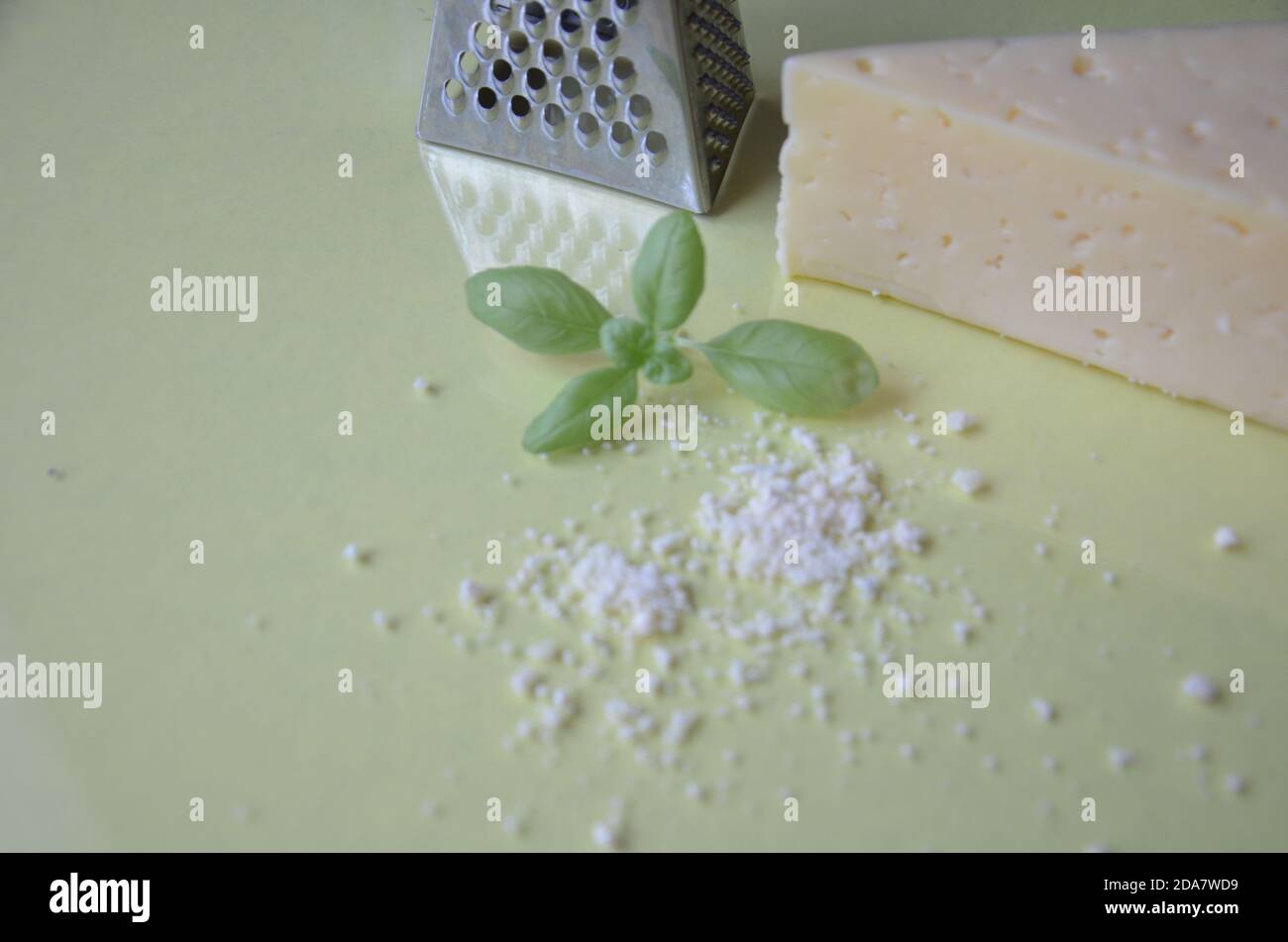 Cheddar cheese block metal cheese grater hi-res stock photography and ...