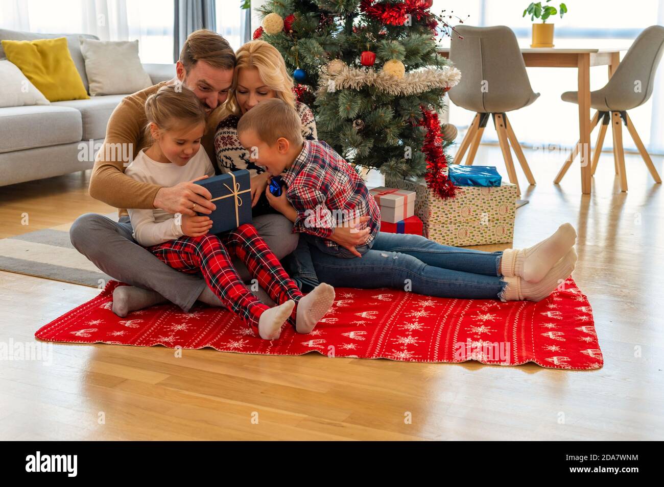 Mom son opening present gift hi-res stock photography and images - Alamy