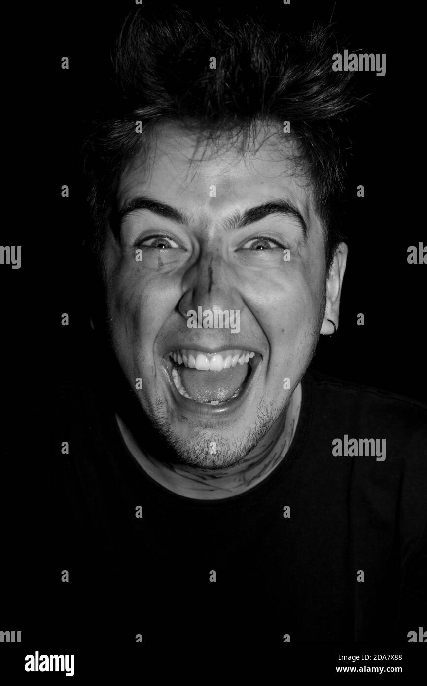 Serious and laughing face hi-res stock photography and images - Alamy