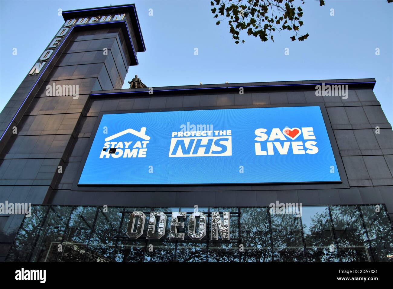 Stay at Home, Protect The NHS, Save Lives sign seen at the closed Odeon ...