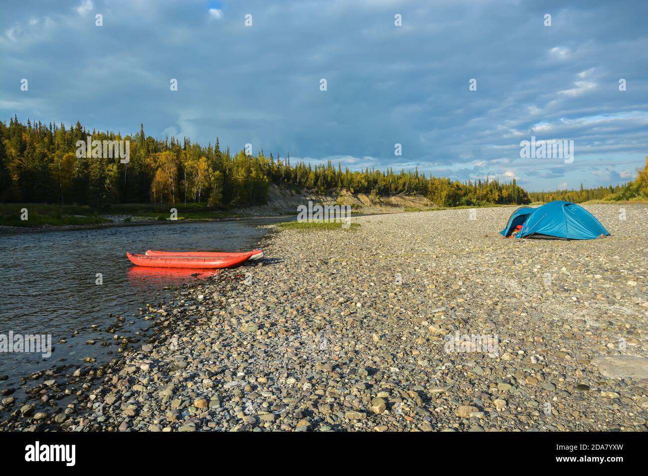 Inflatable kayak on the water. Tourist rafting on the northern river ...