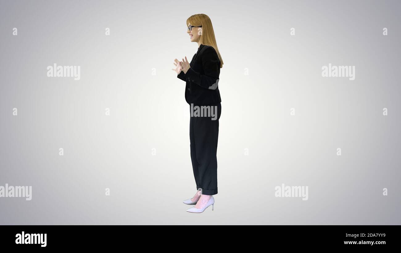 Smiling businesswoman explaining something emotionaly hi-res stock ...