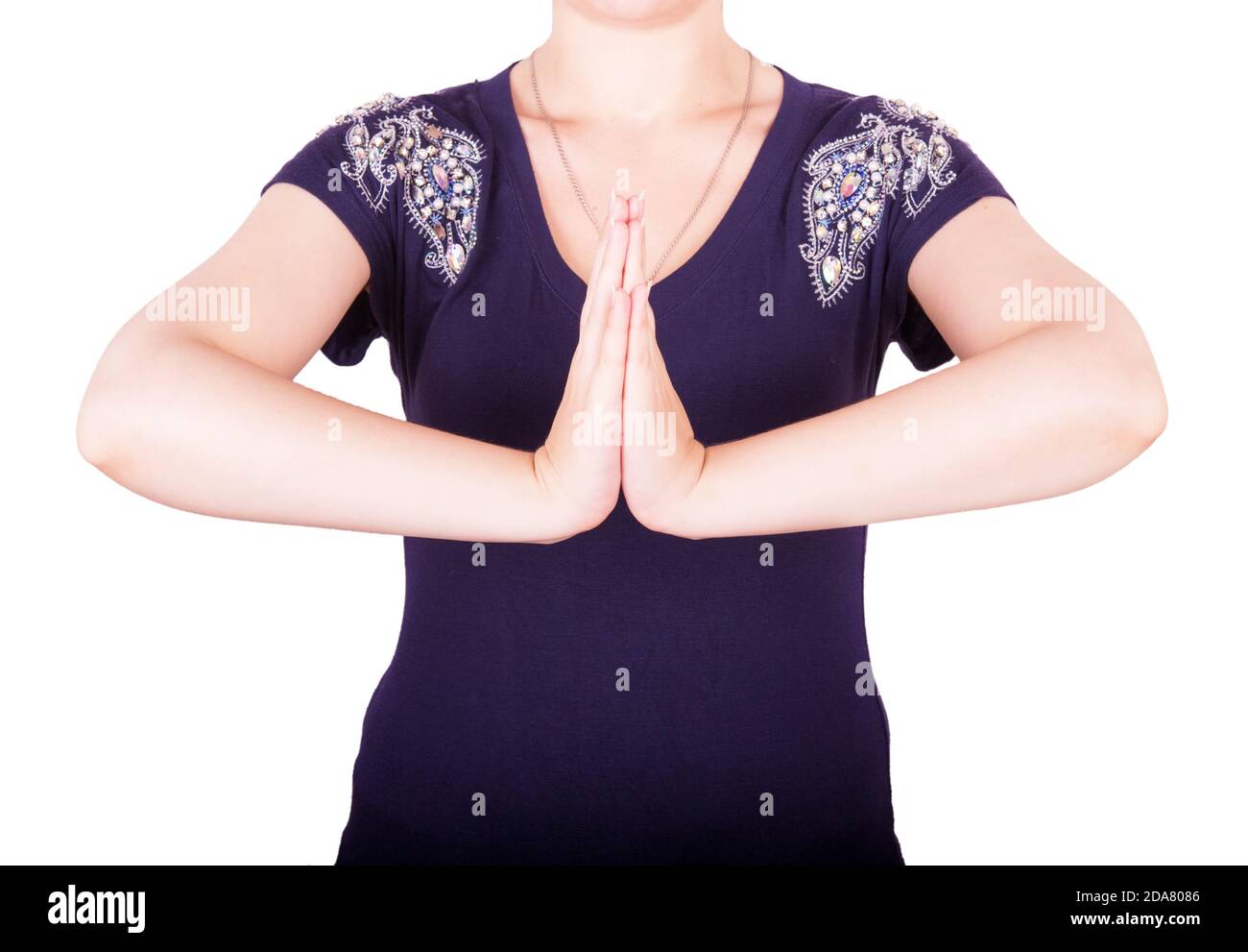 girl shows gesture namaste isolated Stock Photo - Alamy