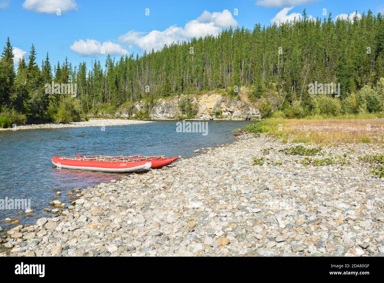 Inflatable kayak on the water. Tourist rafting on the northern river ...