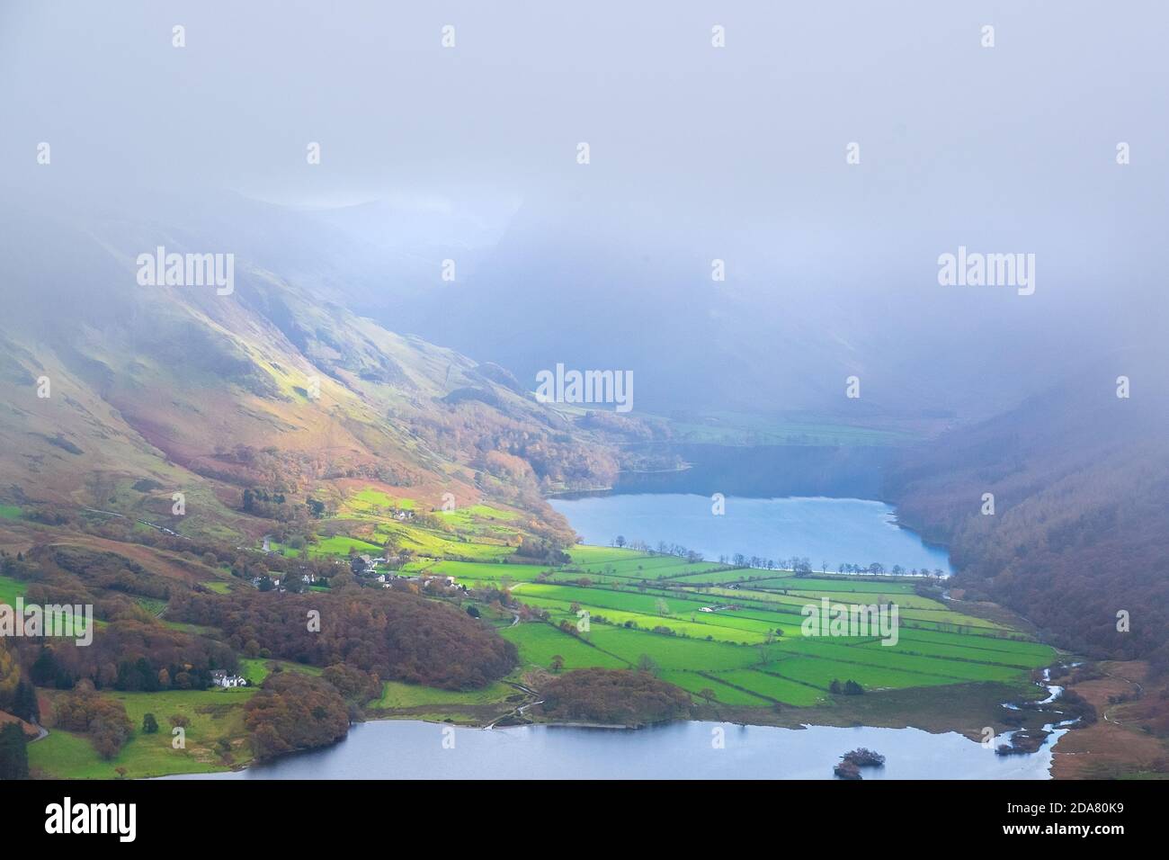 Buttermere seen from the surrounding hills through a gap in the mist ...