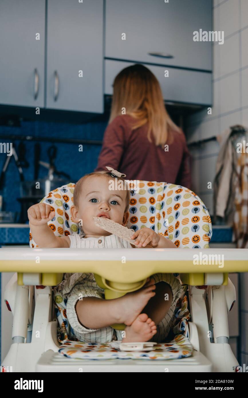 Baby eating finger foods hi-res stock photography and images - Alamy