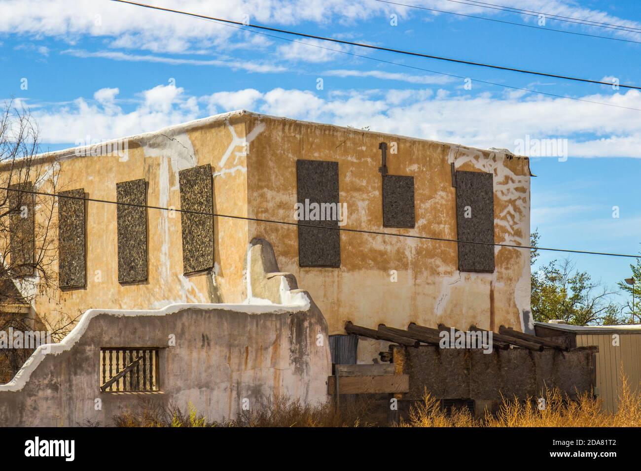 Abandoned Building With Boarded Windows In Compound Stock Photo - Alamy