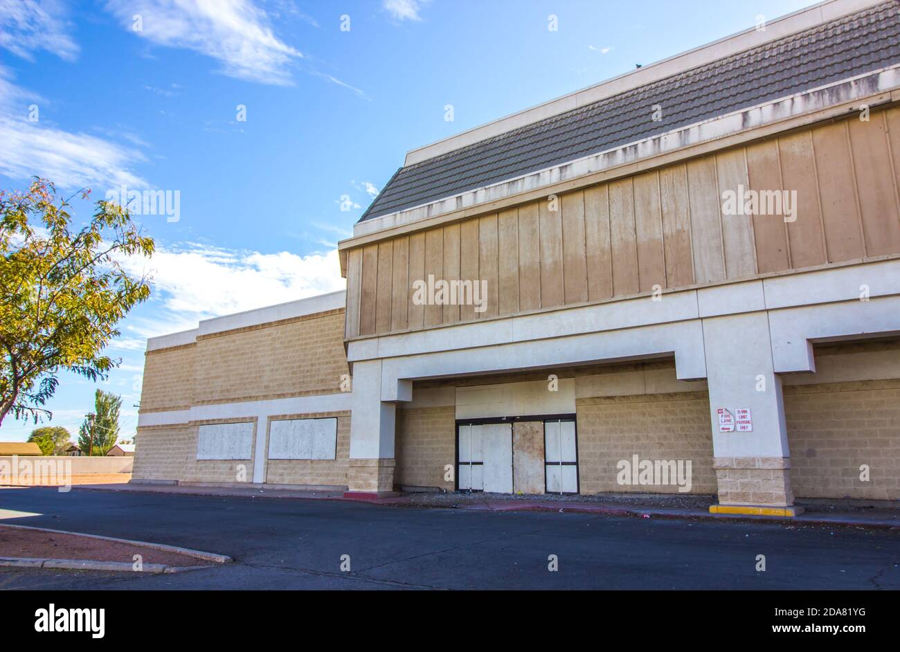 Boarded Up Windows & Entrance To Abandoned Big Box Store Stock Photo ...