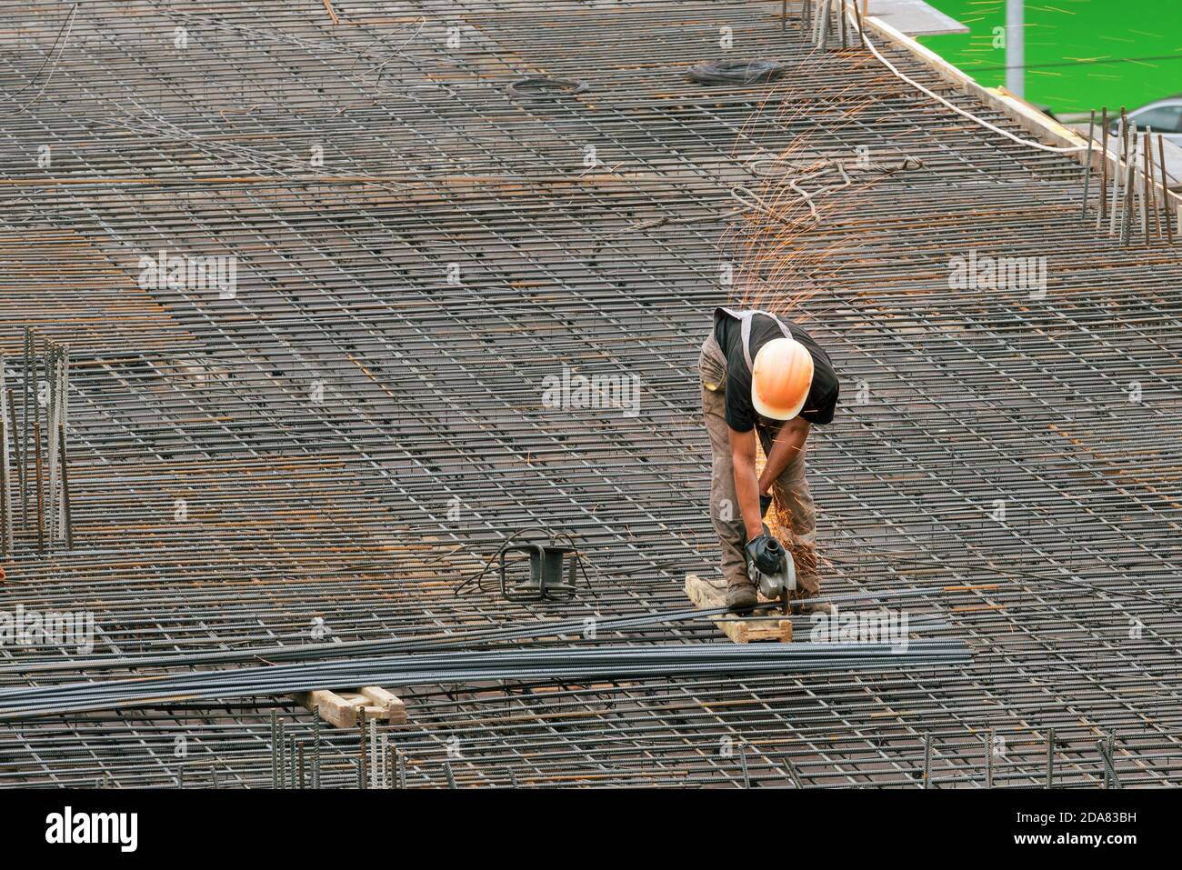 The employee works on the construction site. Performed work electric ...