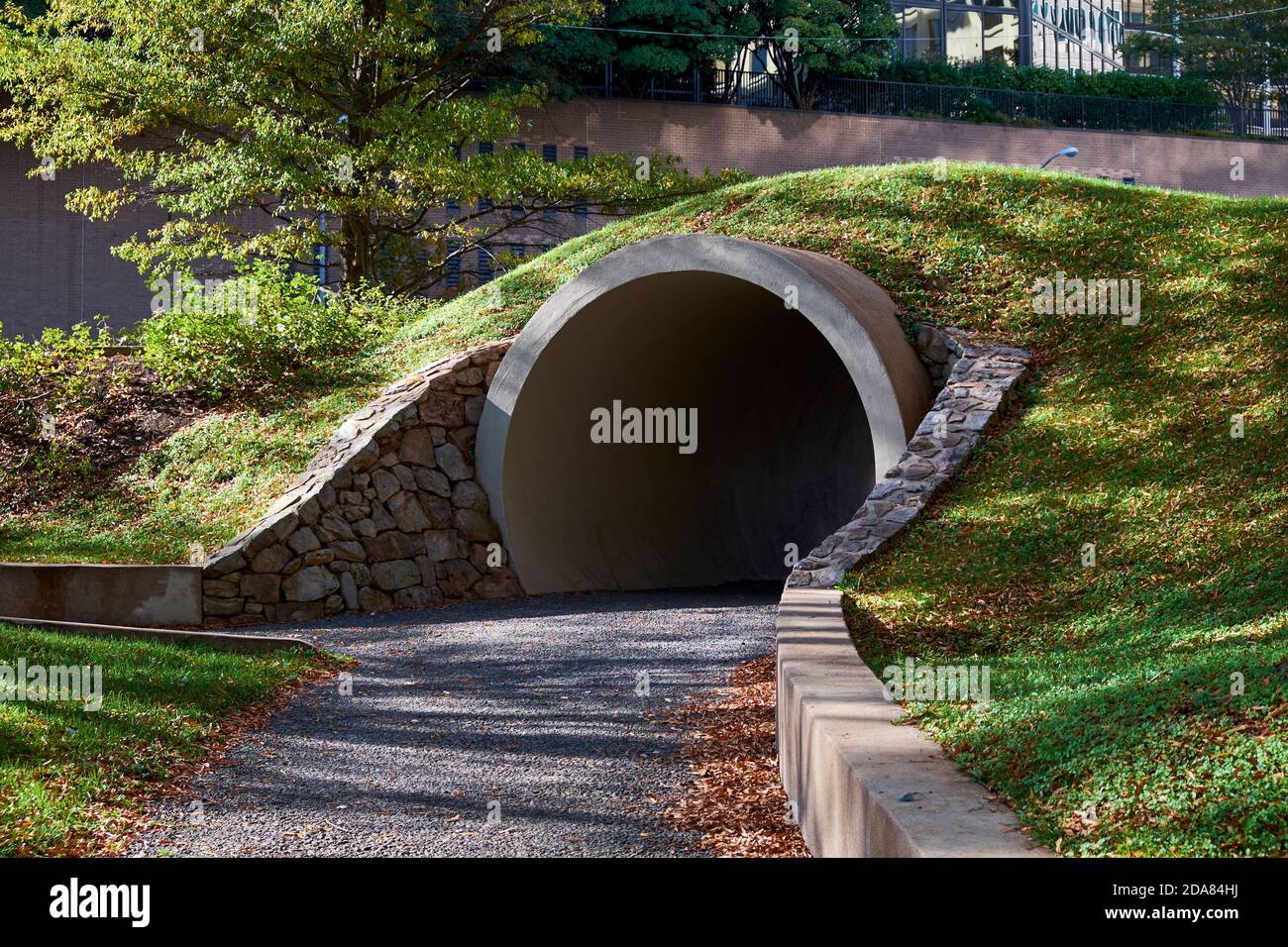 Entrance to a concrete pedestrian tunnel leading to Dark Star Park. In ...