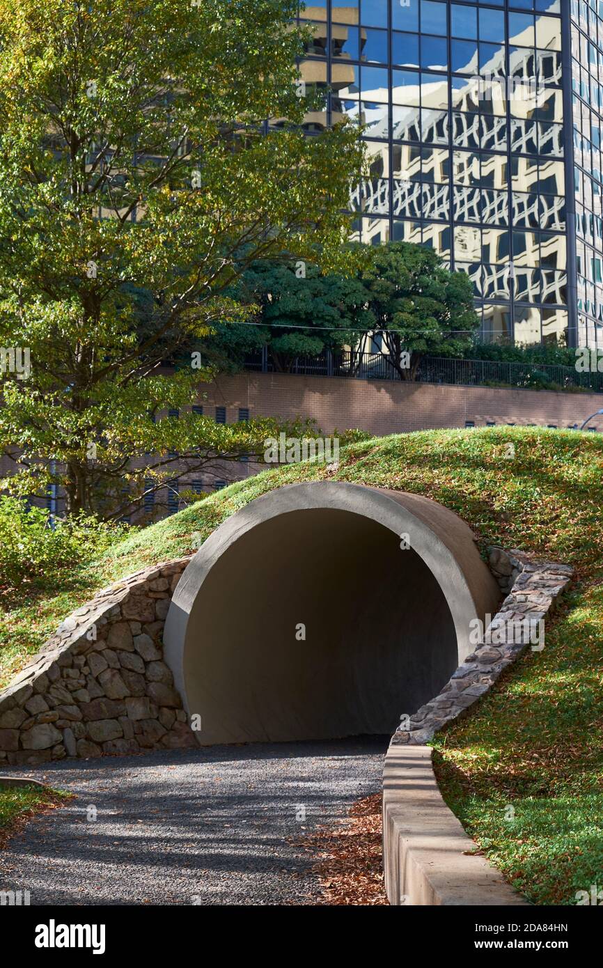 Entrance to a concrete pedestrian tunnel leading to Dark Star Park. In ...