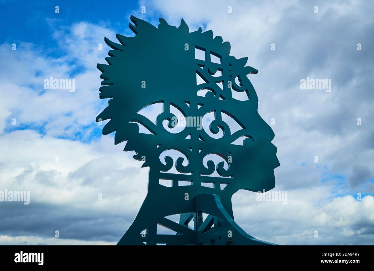 A detail of a silhouette head of the sculpture, "Wrought, Knit, Labors ...