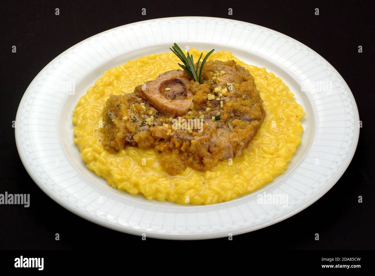 Italian food recipes risotto milanese with marrowbone Stock Photo - Alamy