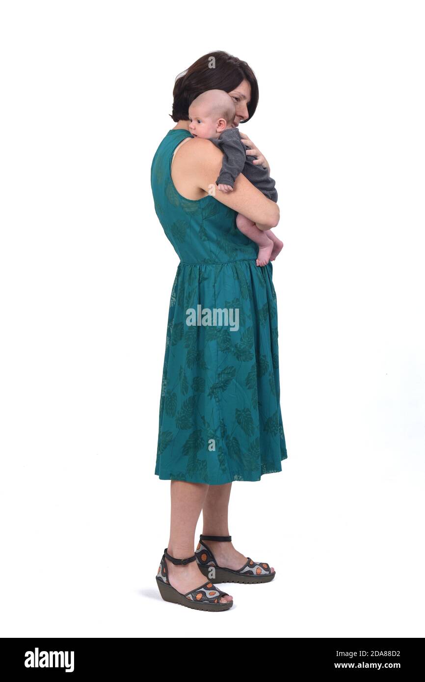 side view of full portrait of a mother with her baby on white ...