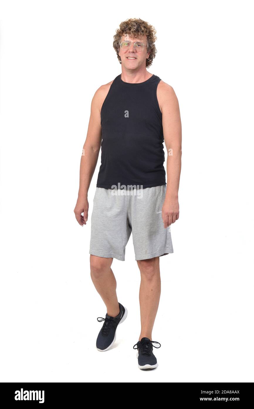 front view of a man walking on white background Stock Photo - Alamy