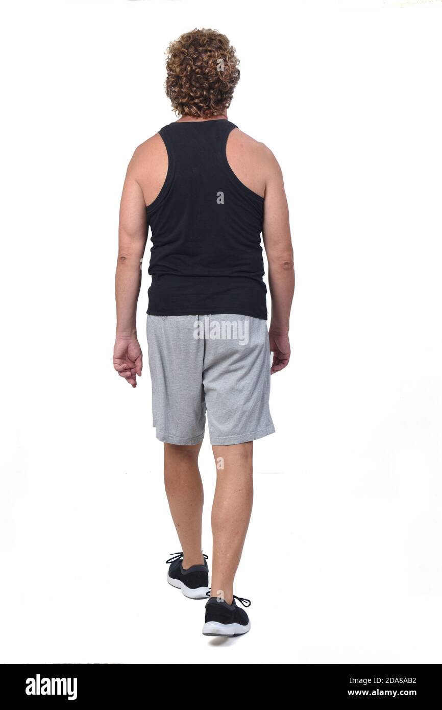 rear view of a man walking on white background Stock Photo - Alamy